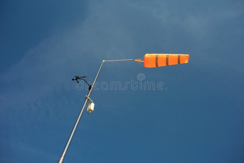 Orange Conical Windsock and Wind Cone Stock Photo - Image of indicate ...