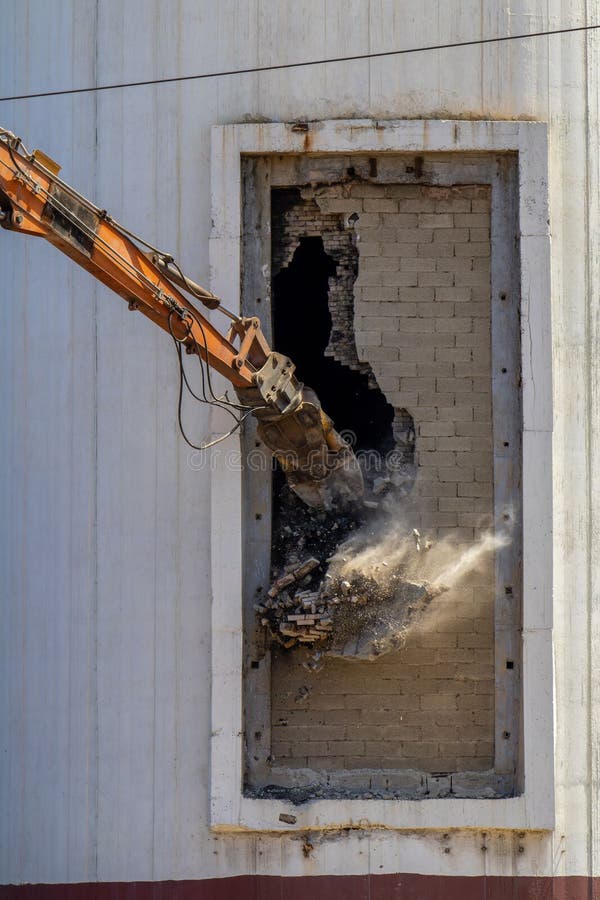 Orange Construction Excavator Machine in Operation on a Demolition Job ...
