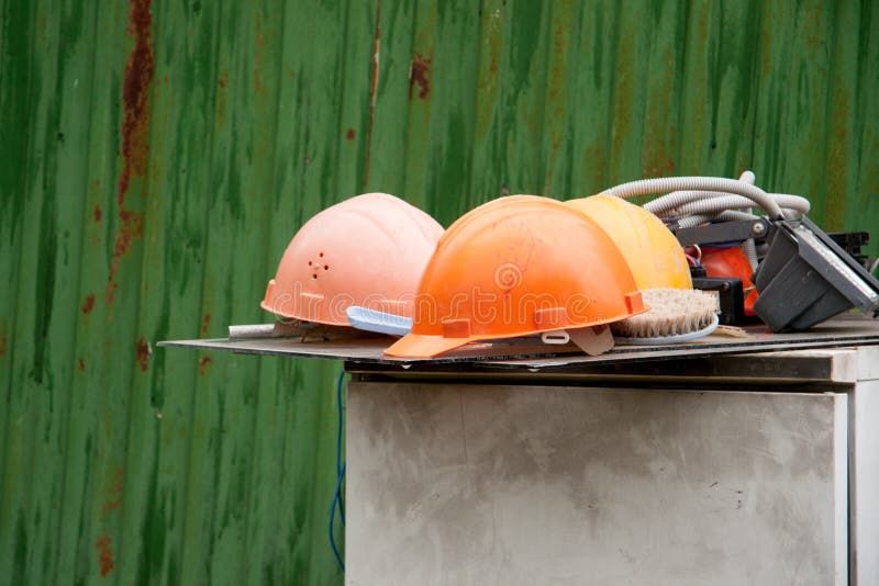 Orange Construction Helmets without Workers. Work Has Stopped Stock ...