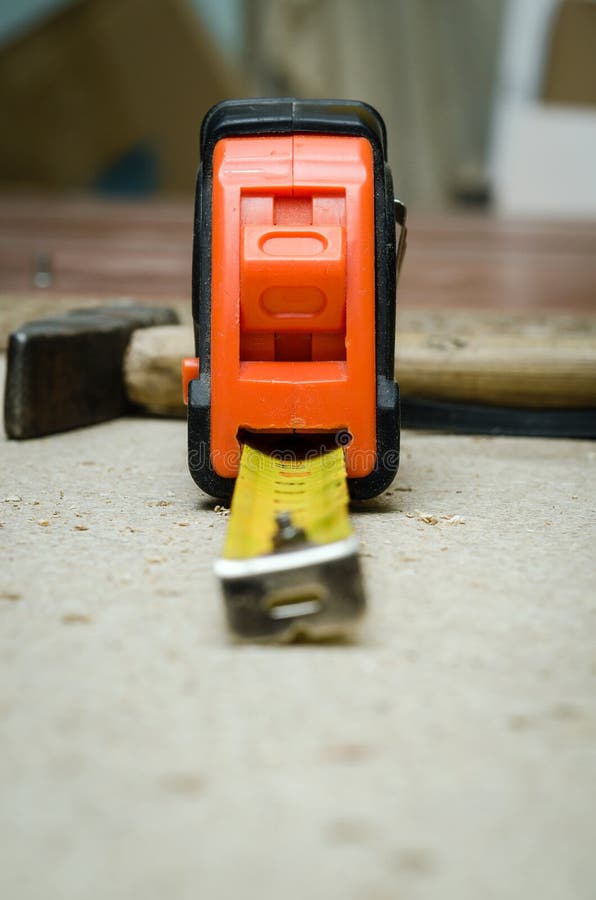 Orange Construction Tape Measure Stock Image - Image of industrial ...