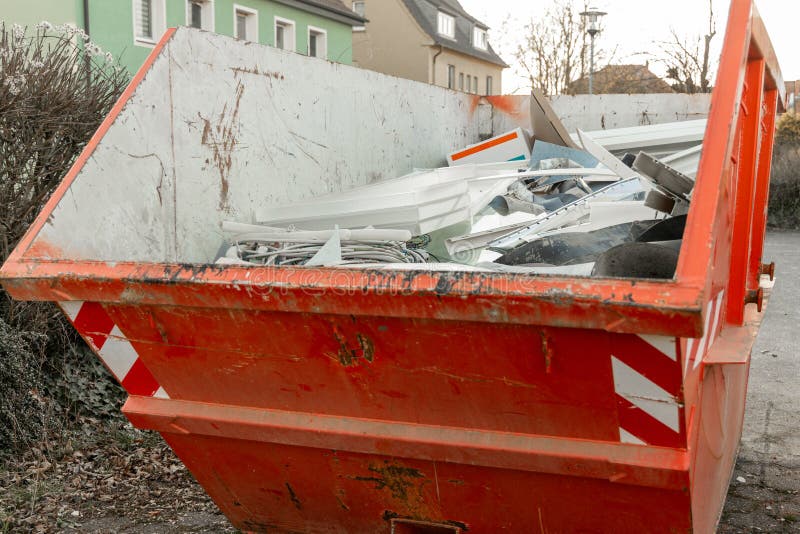 Orange Container Filled with Construction Waste. Container for ...