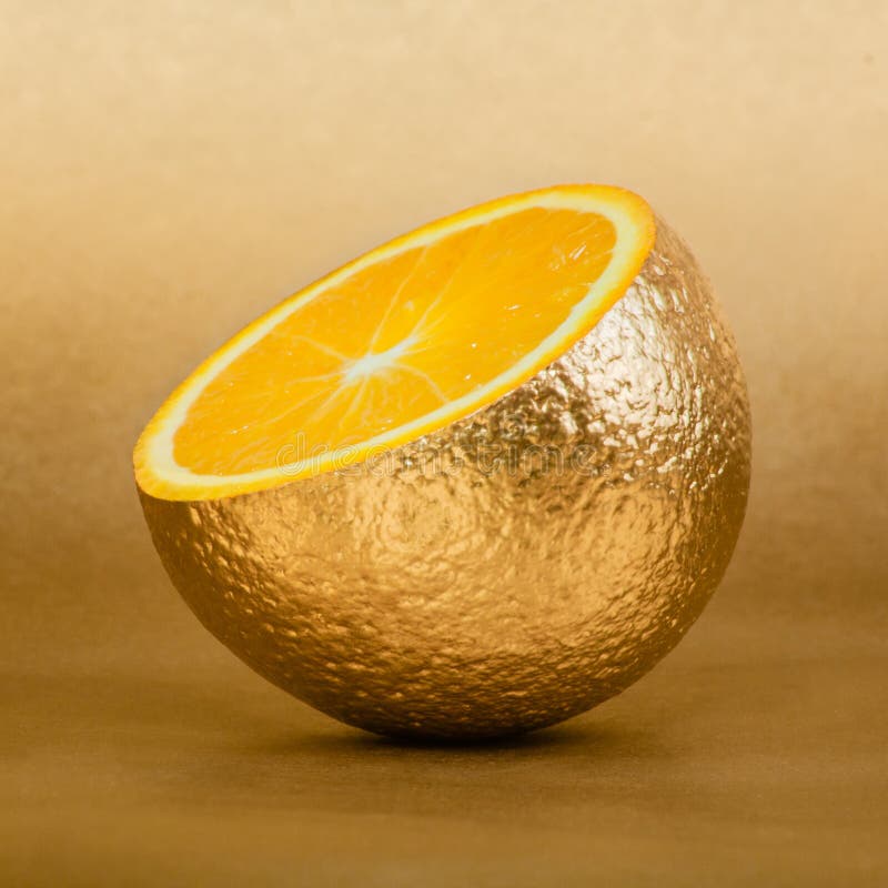 Whole and Opened Orange with Golden Peel on Gold Background Stock Image ...