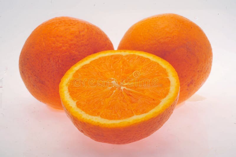 Orange with Cut in Half and Green Leaves Isolated on White Background ...