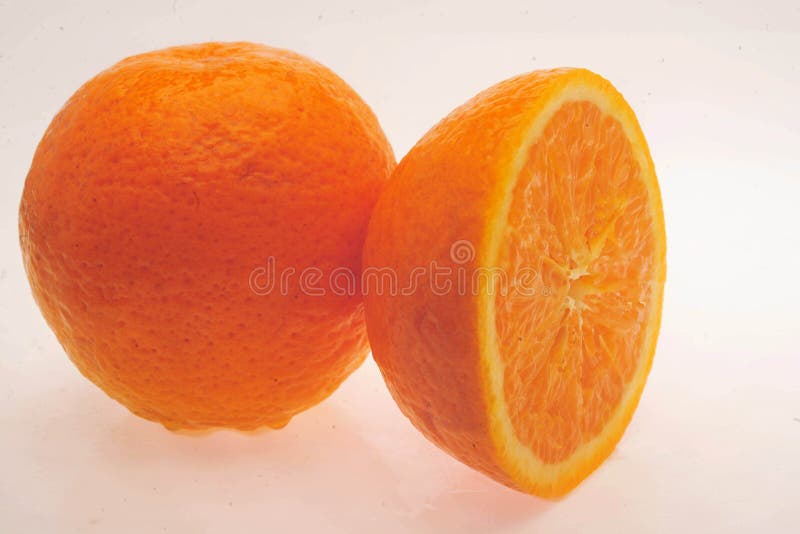 Orange with Cut in Half and Green Leaves Isolated on White Background ...