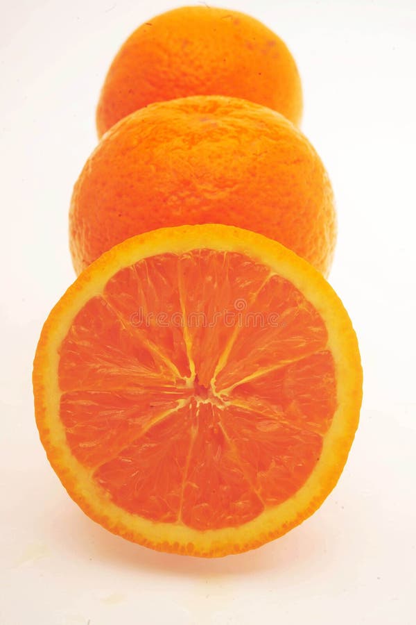 Orange with Cut in Half and Green Leaves Isolated on White Background ...