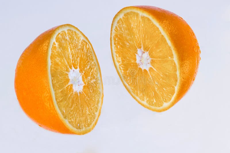 Orange Is Cut Into Two Parts Stock Image - Image of macro, citrus: 66209129
