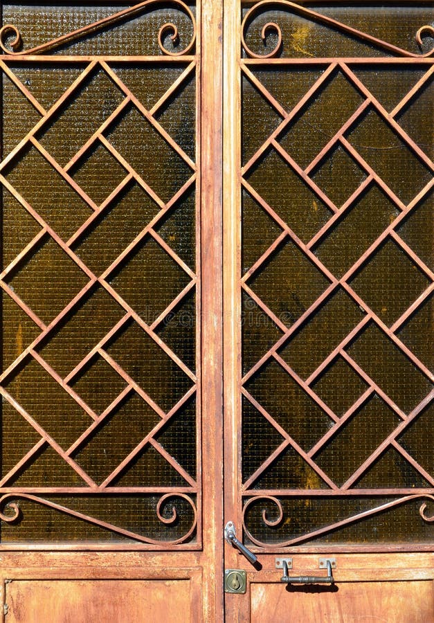 Orange door stock photo. Image of iron, gate, metal, lock - 31141280