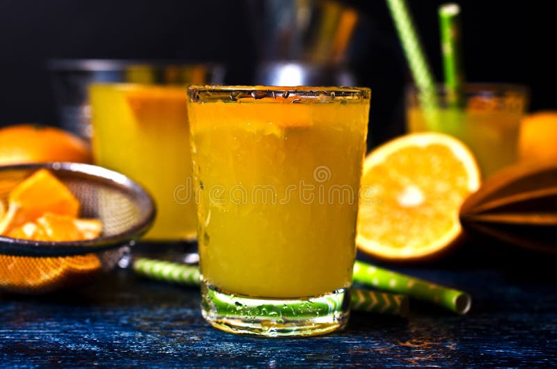 Orange drink in a glass stock image. Image of glass, orange - 83426549