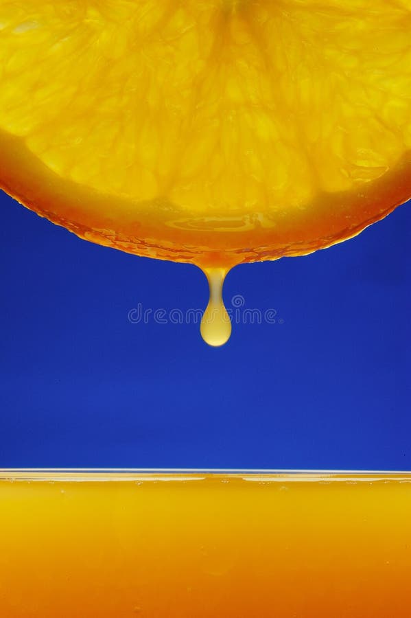 Orange Drop in Glass Flask with Vial and Chemical Molecular on Blue ...