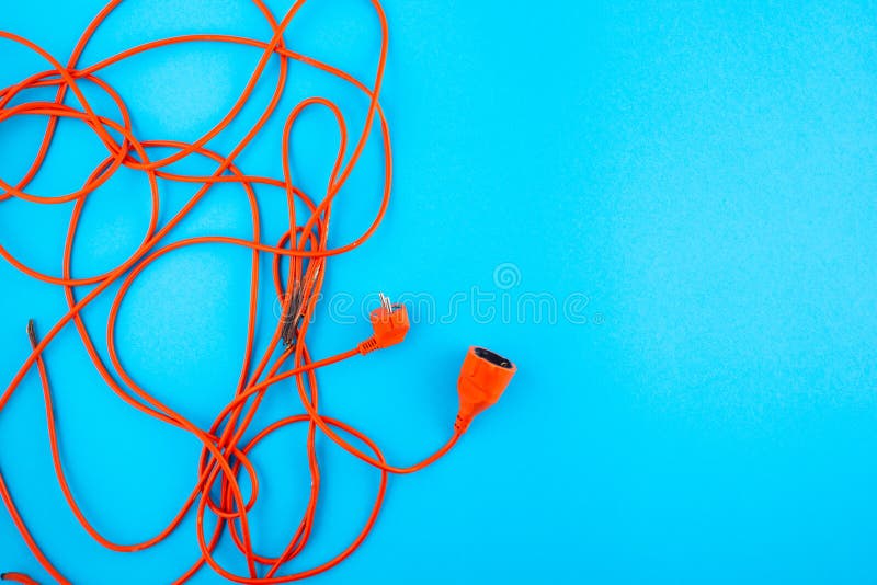 Orange Electrical Wire on Blue Background. Stock Photo - Image of ...