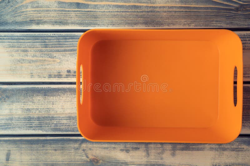 Orange Empty Plastic Container, Box on Wood Table Background ...