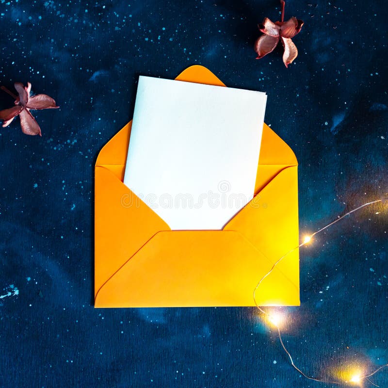 An Orange Envelope in Which a Blank White Sheet for Text. Flat Lay ...