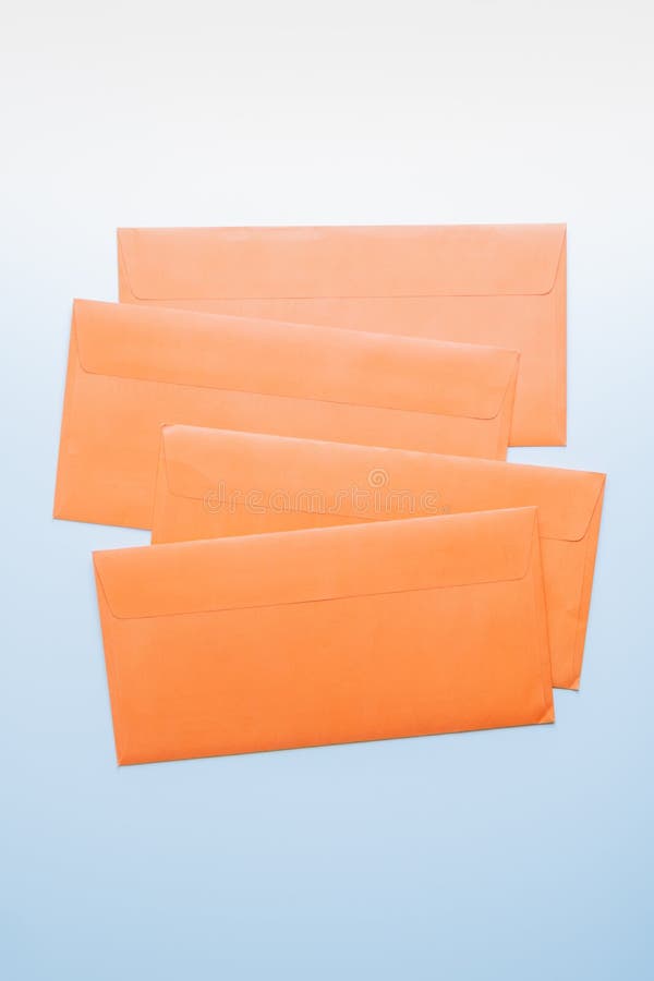 Orange Envelopes in White Background, Top View. Stock Image - Image of ...