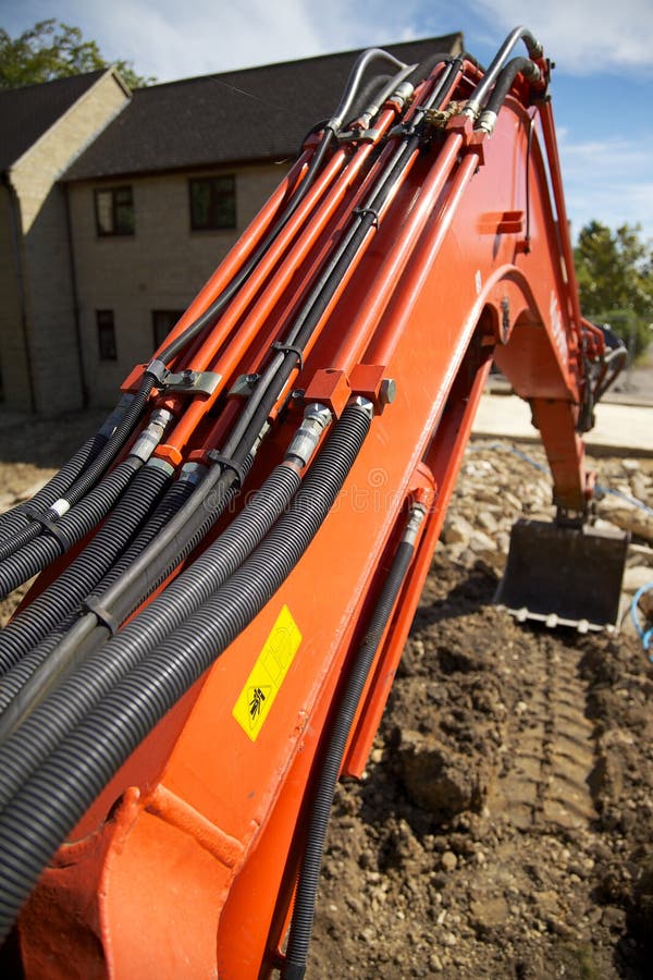 Orange Mechanical Digger Arm Stock Photo - Image of hired, digger: 16204384