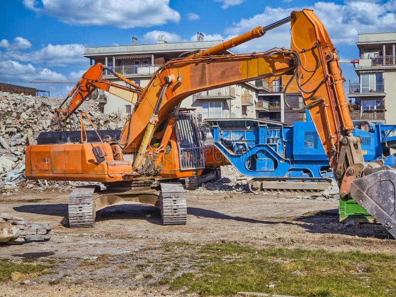 Orange Excavator on the Construction Site Stock Photo - Image of ...