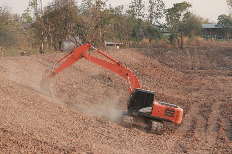 Orange Excavator the Engine is Running. Stock Image - Image of ...
