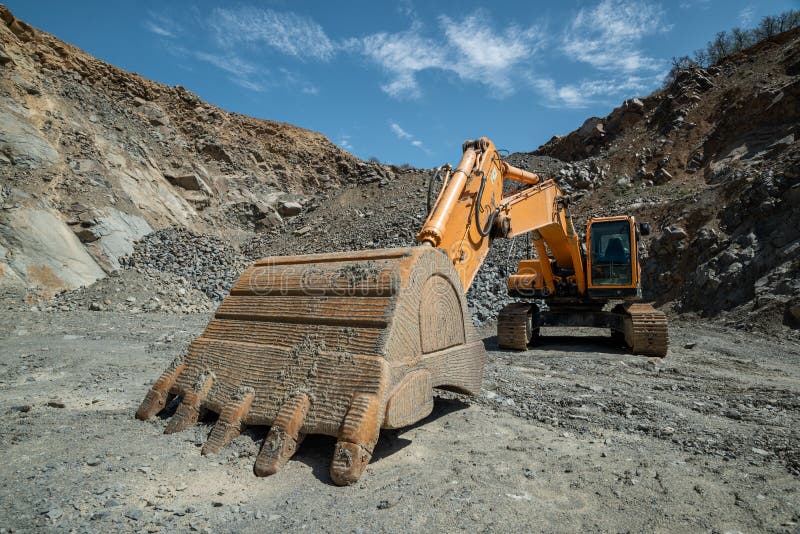 Excavator in an Open-type Stone Quarry Stock Image - Image of machine ...