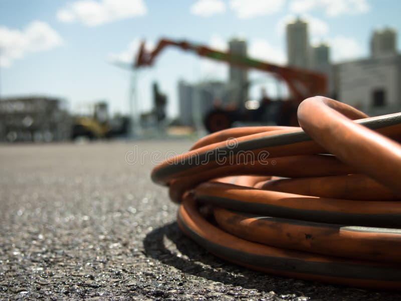 The Orange Extension Cord on the Ground at the Constructionsite Stock ...