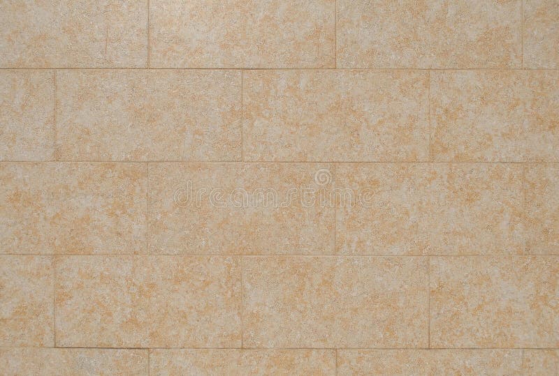 Orange Facing Tiles Made of Stone on the Wall of the Building. Stock ...