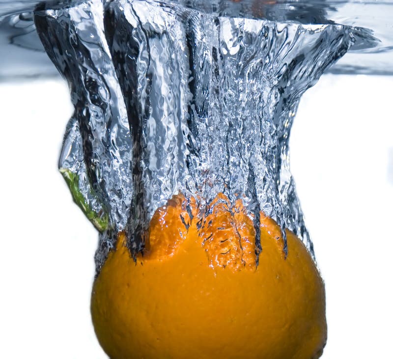 Orange falling in water stock image. Image of falling - 12743439