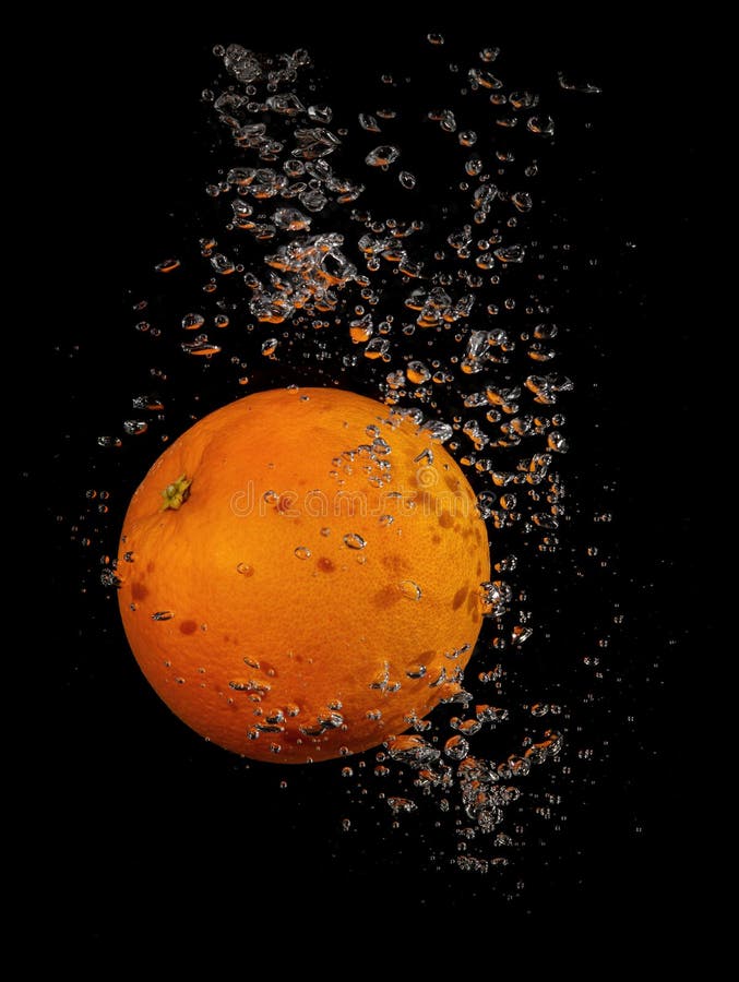 Orange falling in water stock photo. Image of food, fresh - 216860518
