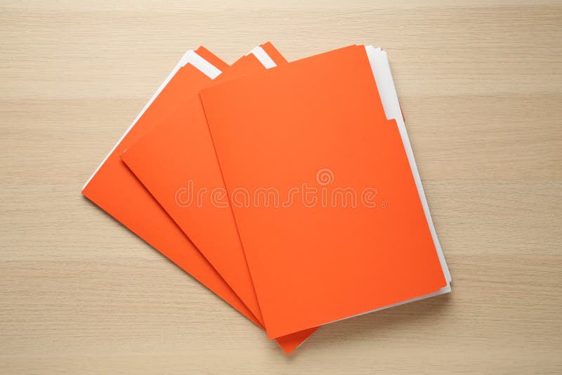 Orange Files with Documents on Wooden Table, Top View Stock Photo ...