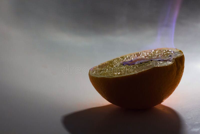 Orange in fire stock image. Image of creative, fire, abstract - 83905481