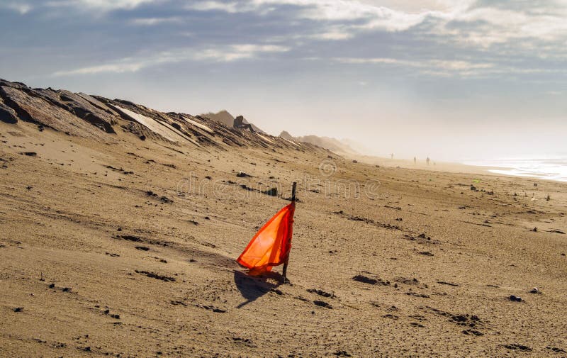 Orange Flag on the Beach at Sunset Stock Image - Image of summer ...