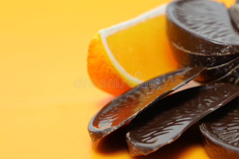 Orange Flavor Chocolates Isolated on a Orange Background Stock Photo ...