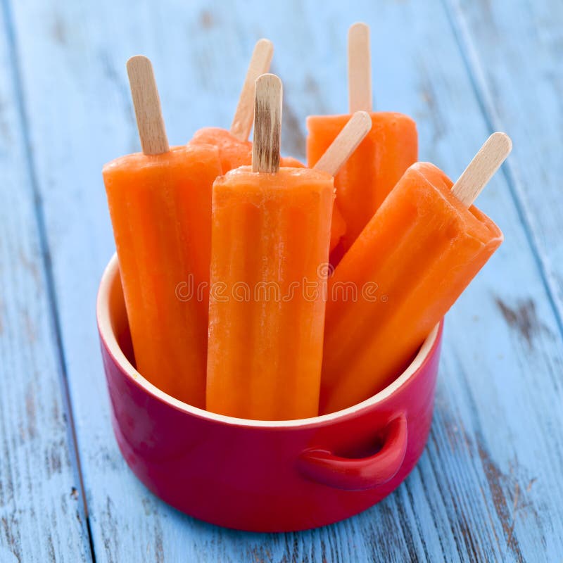 Orange flavored ice pops stock photo. Image of colorful - 92465390