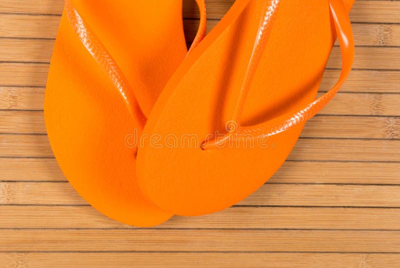 Orange Flip Flops on Bamboo Mat Closeup Stock Photo - Image of sandal ...