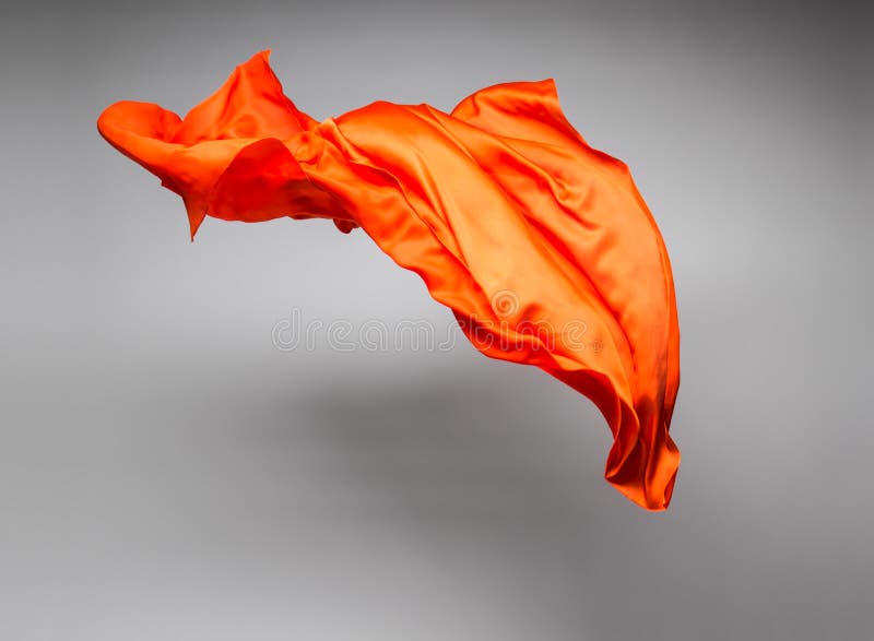 Orange flying fabric stock image. Image of satin, wave - 80279993
