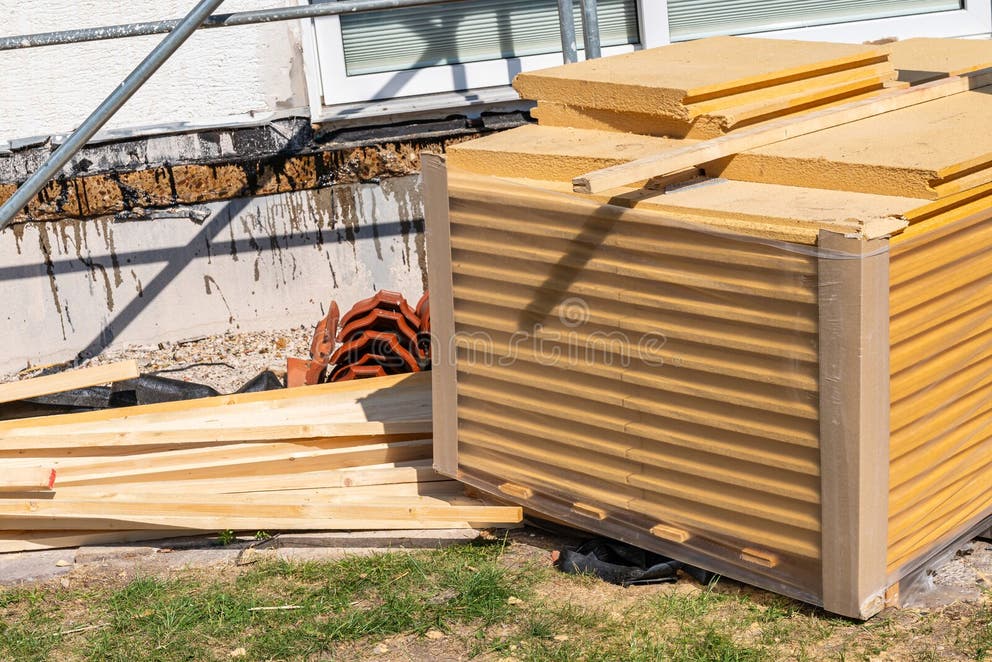 Orange Foam Insulation Boards in a Container at a Construction Site ...