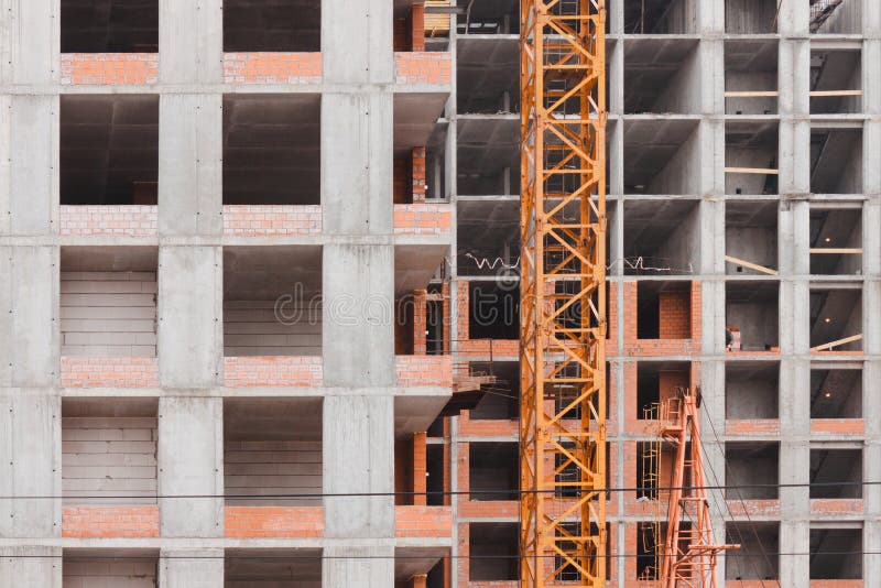 An Orange Frame of a Crane on a Dark Building Site. Front View Stock ...