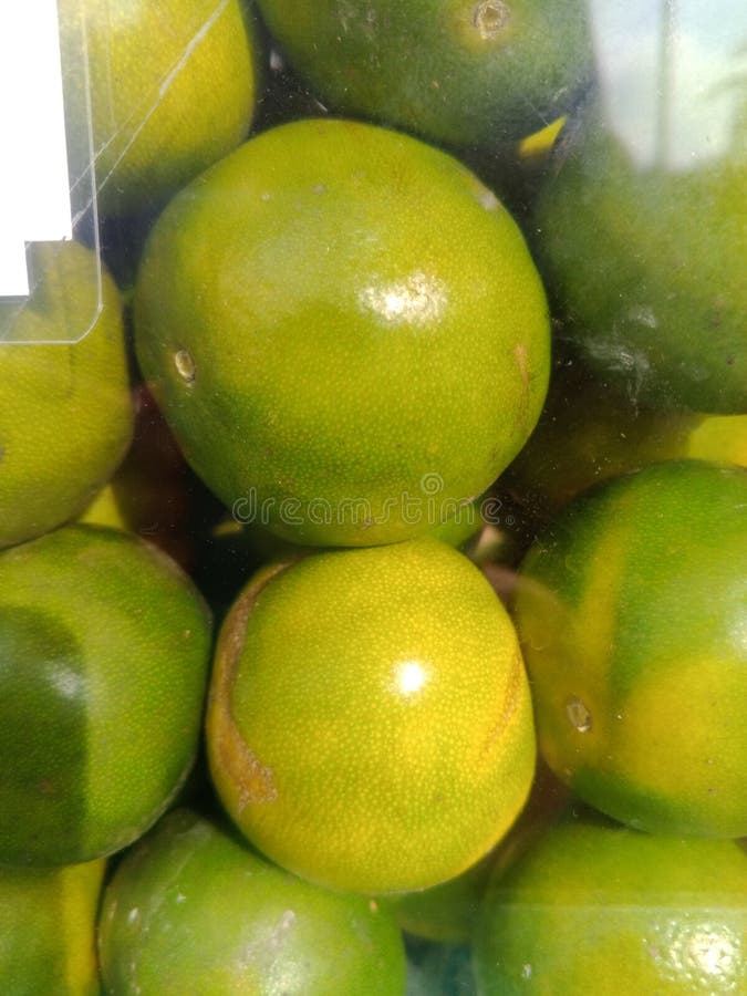 Orange Fruit is Green and Also Yellowish Stock Image - Image of flower ...