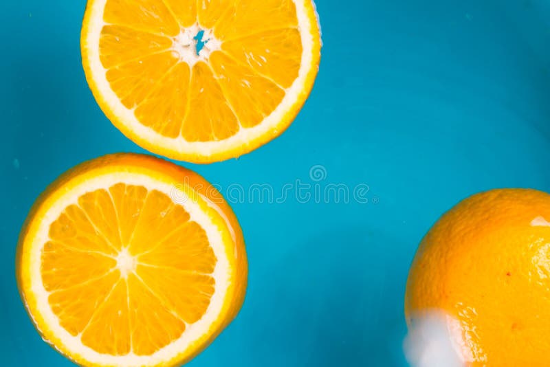 Orange Fruits Fall Deeply Under Water Stock Photo - Image of healthy ...