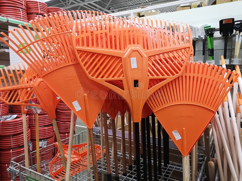 Orange Garden Rake Stands in a Box in a Large Building Store Stock ...