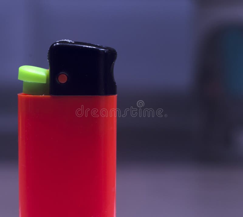 Orange gas lighter stock photo. Image of blank, tobacco - 110926872