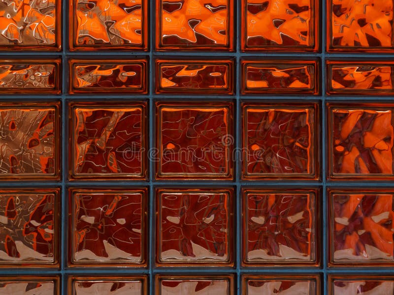 Orange Glass Wall. Glass Tiles of Square and Rectangular Shape Stock ...