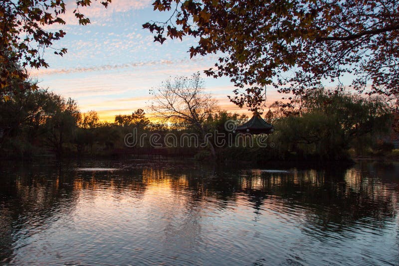 Sunset Over Pond stock image. Image of outdoor, glow - 101877153