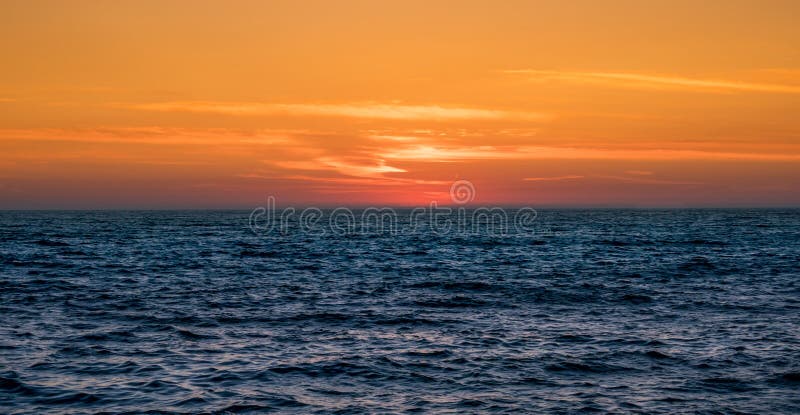 Orange Gradient Sky at Dusk Over Ocean, Just after Sunset with Dark ...