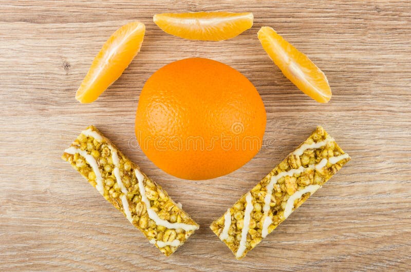 Orange and Granola Bars with Cereals on Table Stock Image - Image of ...