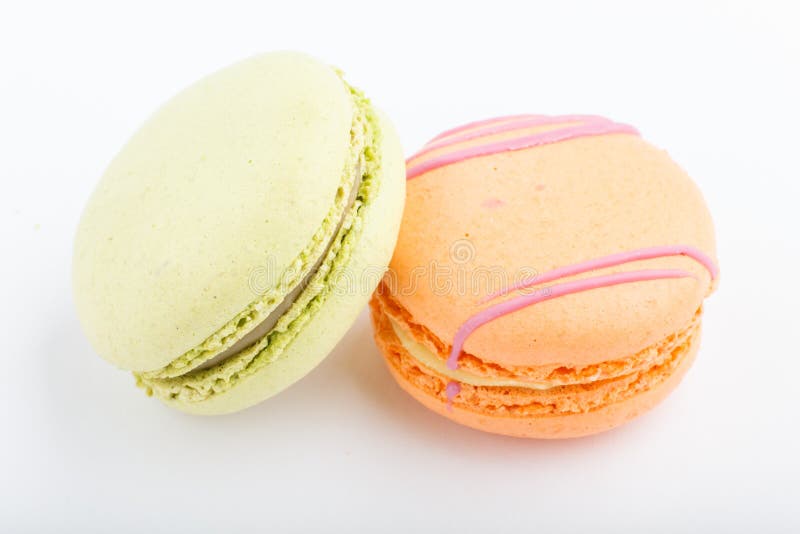 Orange and Green Macarons or Macaroons Cakes Isolated on White ...