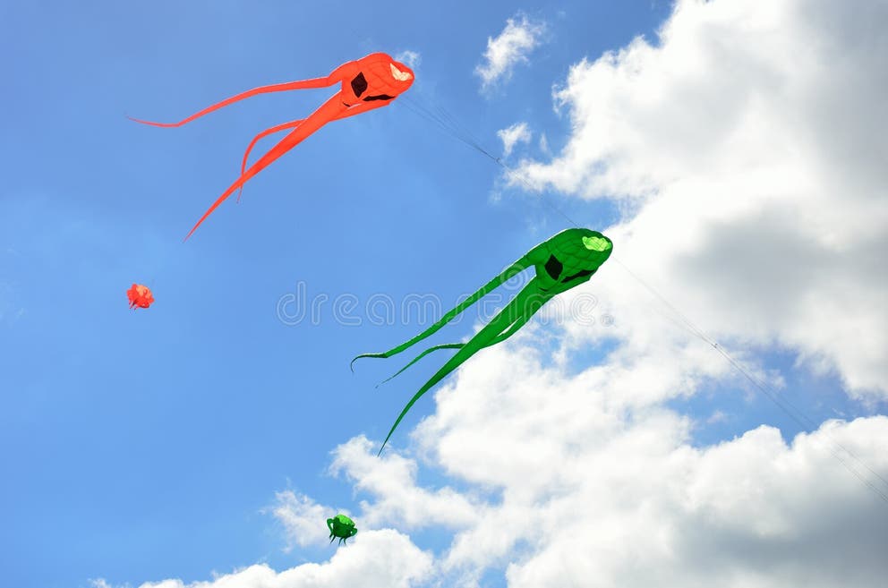 Orange and Green Space Invader Kites Stock Image - Image of high, green ...