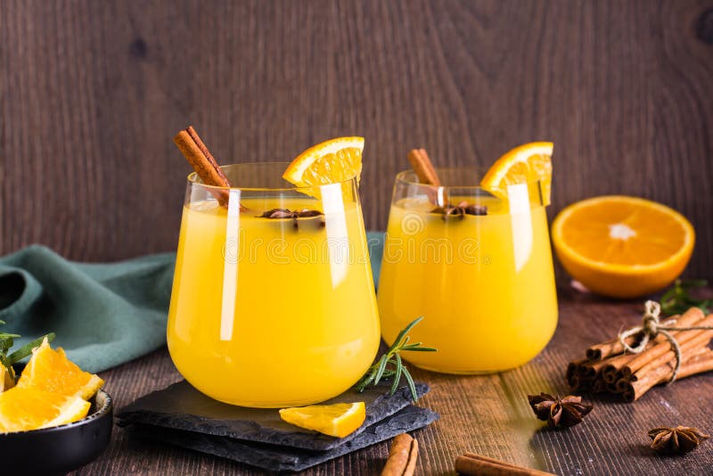 Orange Grog with Cinnamon and Cardamom in Glasses on the Table ...