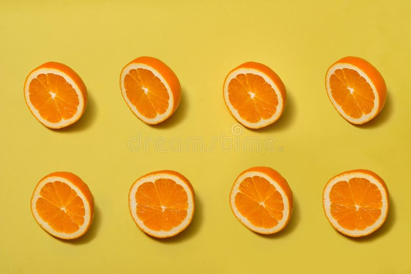 Orange with Halves Ripe Orange on Yellow Background Stock Photo - Image ...