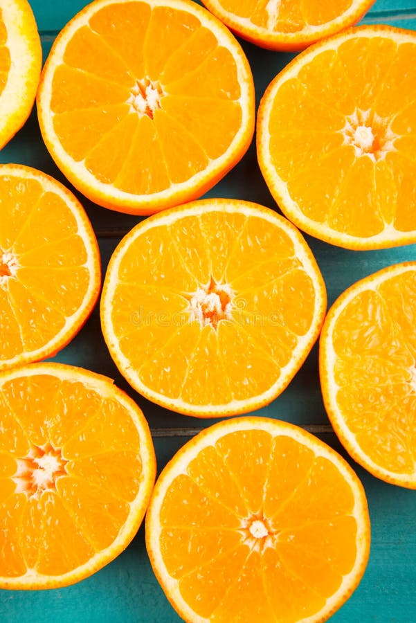 Orange halves on table stock image. Image of slice, natural - 44408901