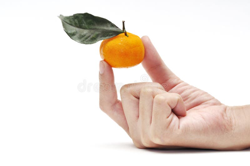 Orange in hand stock photo. Image of fresh, food, closeup - 17944190