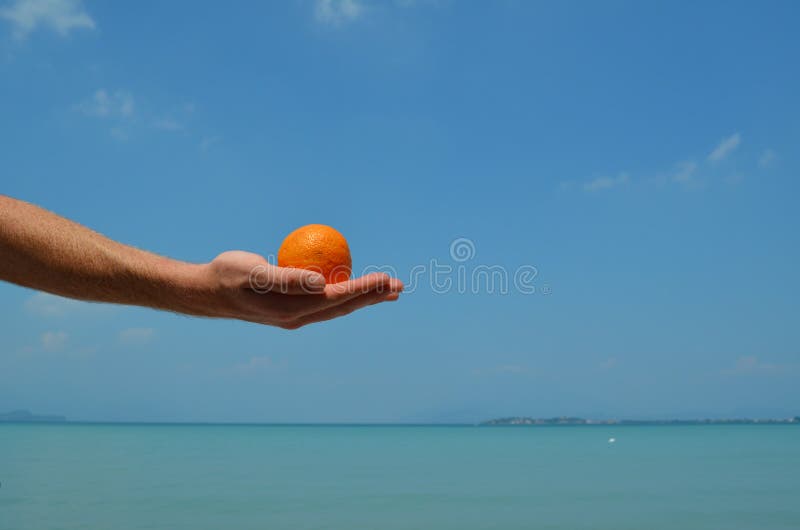 Orange Hand stock image. Image of midair, cloudless, flying - 27438171