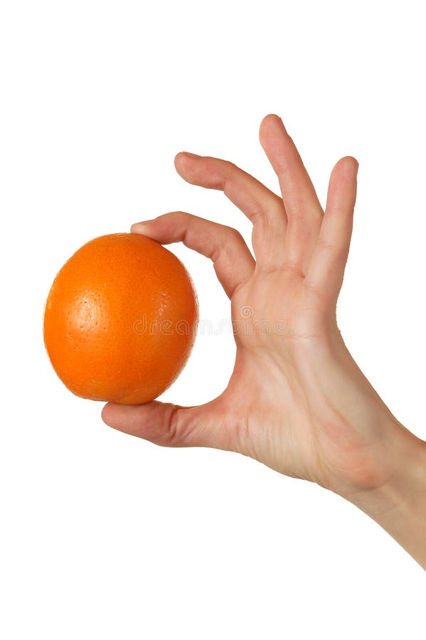 Orange In Hand Picture. Image: 4633235